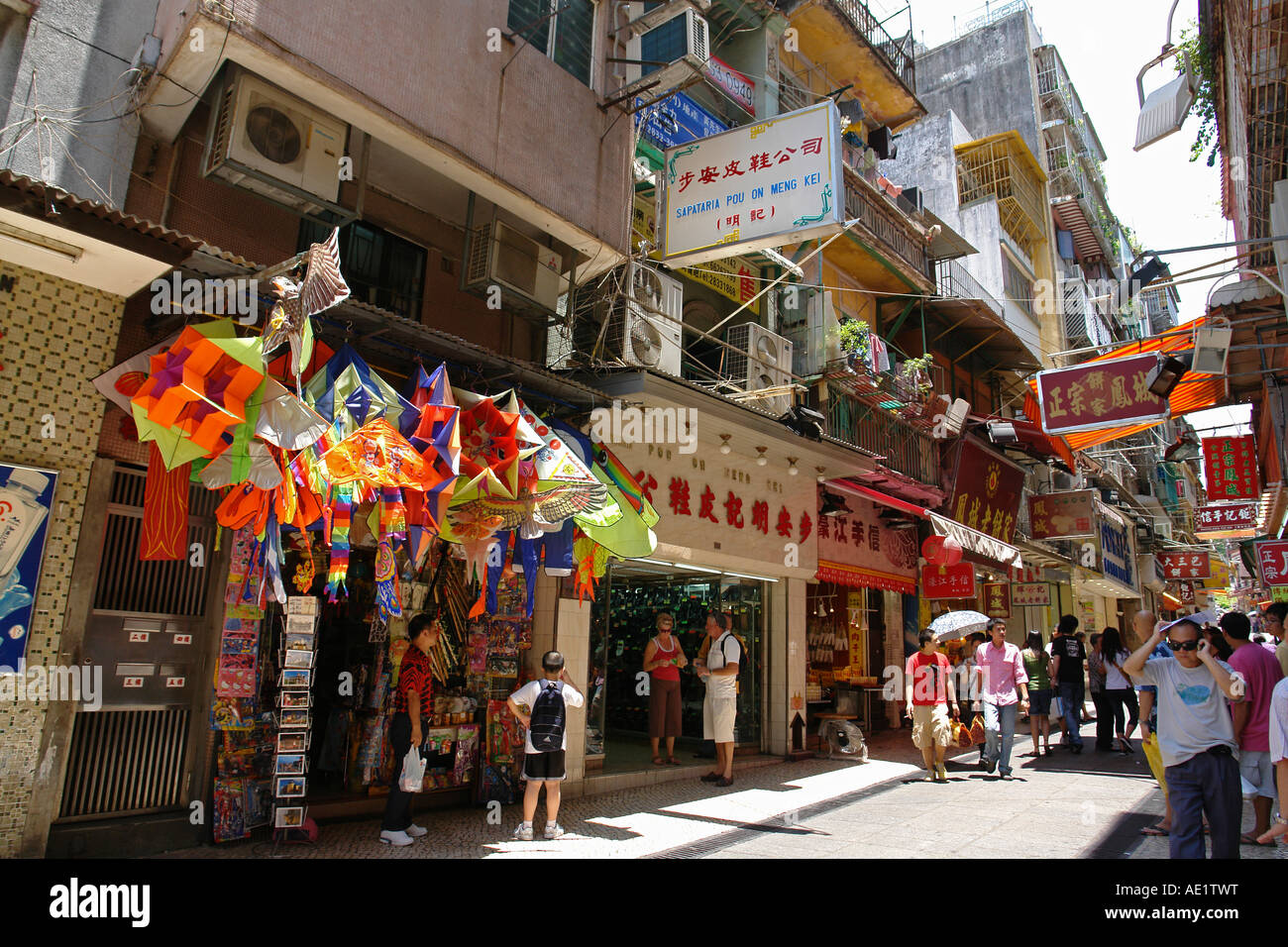 Narrow shopping street in Macau China Stock Photo - Alamy