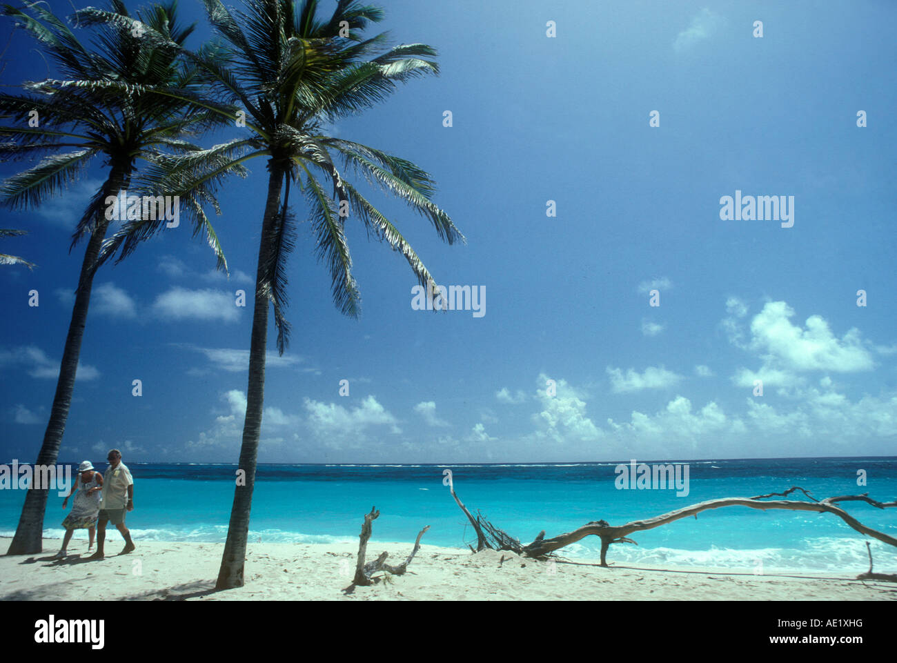 Tourists on beach in Barbados 2002 Stock Photo - Alamy