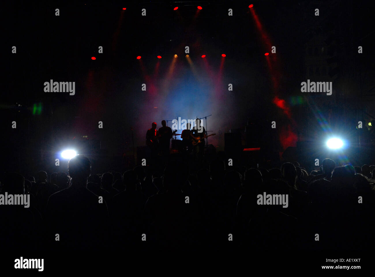 Guitarist playing electric guitar at a rock music concert in Tel Aviv ...