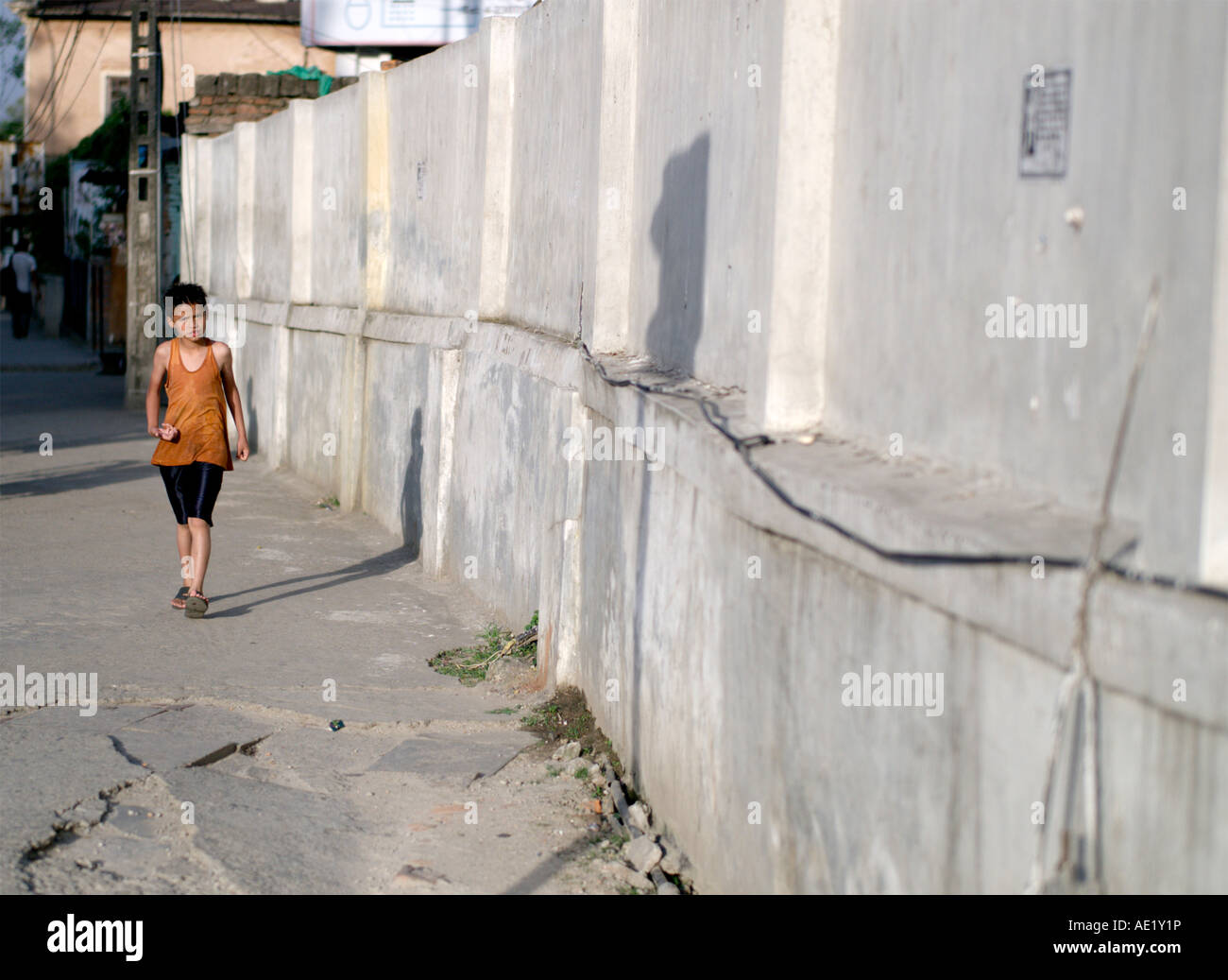 Boy walking on street Kathmandu Stock Photo - Alamy