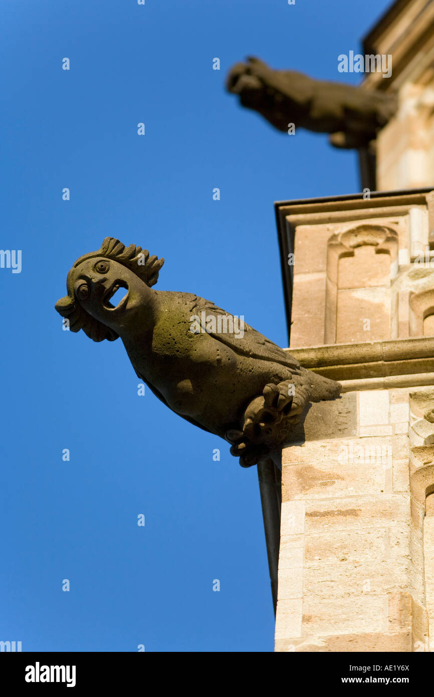 Gargoyle on Gothic tower of Altes Rathaus city hall old quarter of city ...