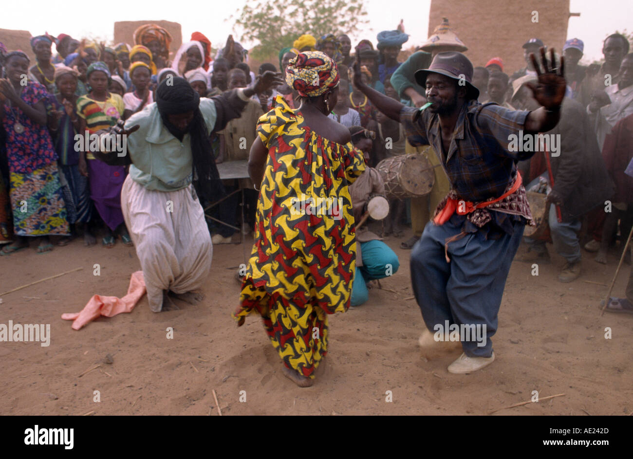 Dogon men and women dance during a village celebration, Mali Stock ...