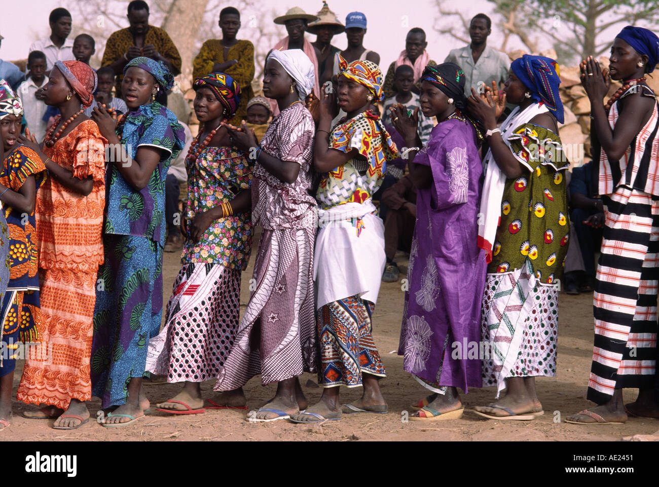 Dogon women dance in procession during a village celebration, Mali ...