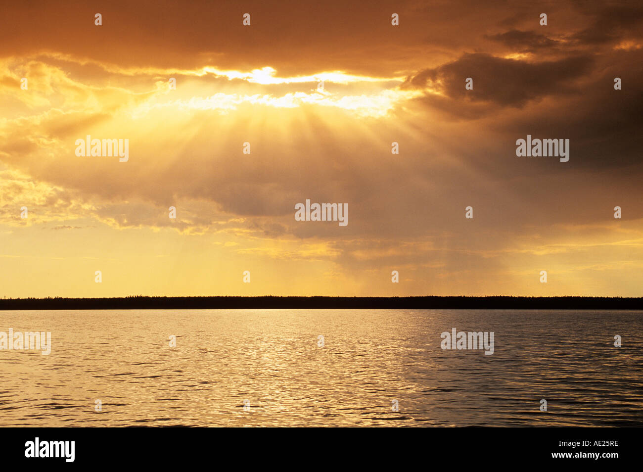 sun breaking through clouds Stock Photo - Alamy