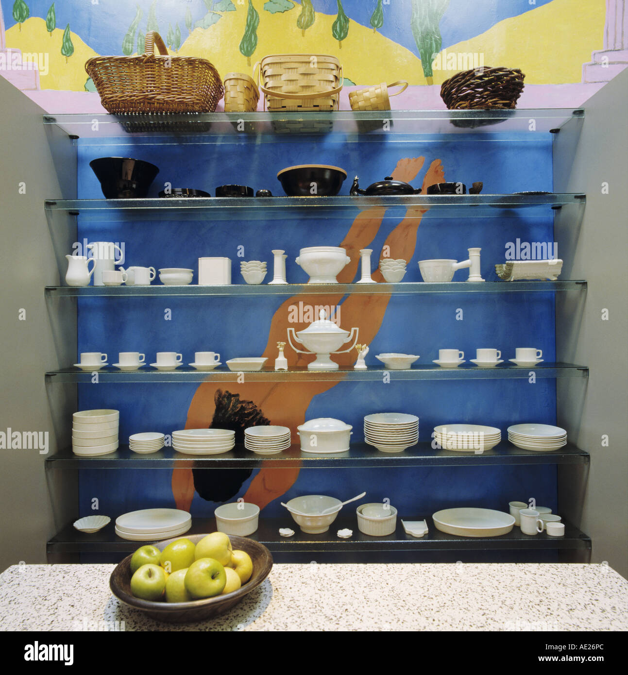 Crockery Collection on Shelf infront of painted mural Stock Photo - Alamy