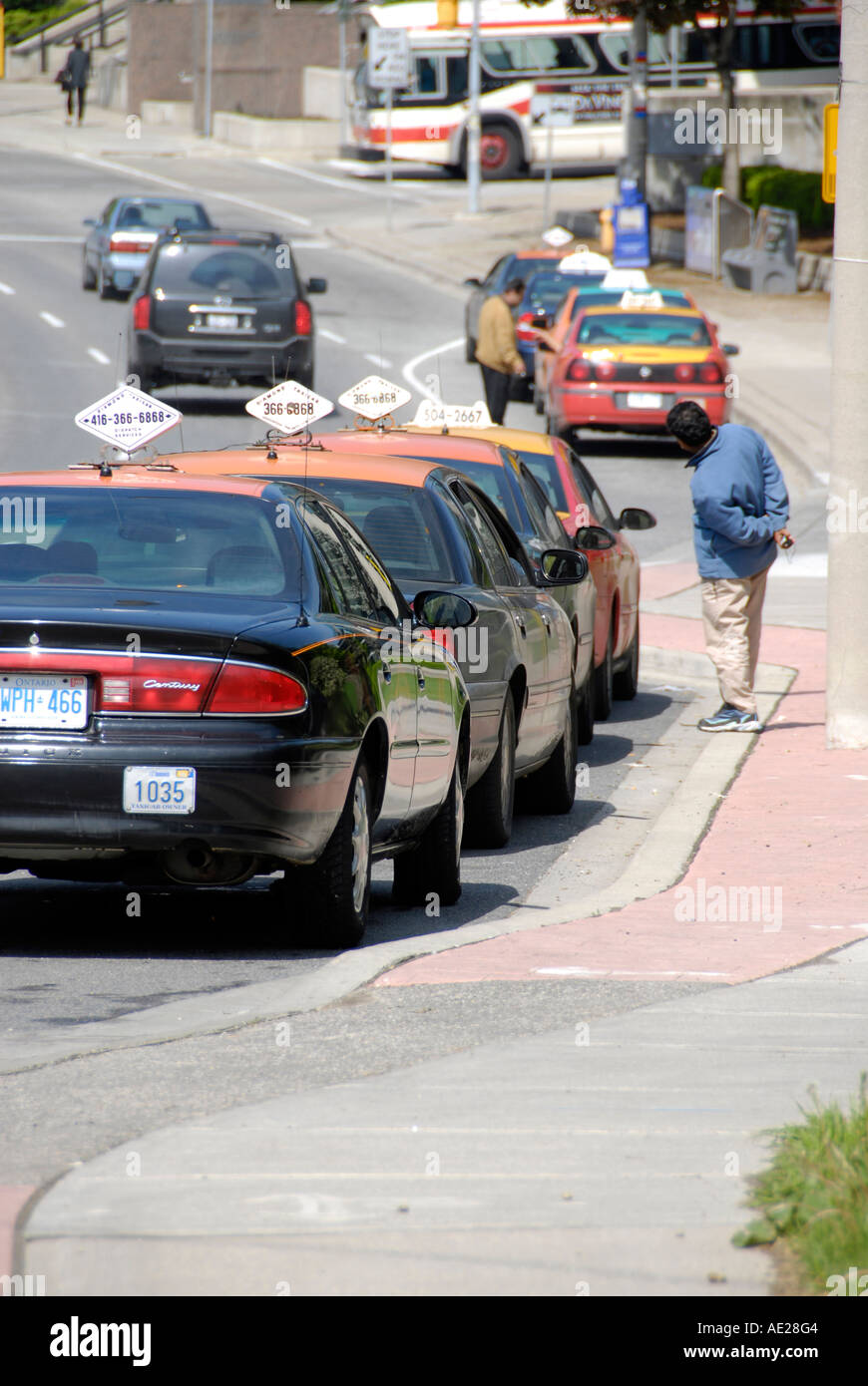 Taxi cabs line up outside a subway station in Toronto Ontario Canada ...