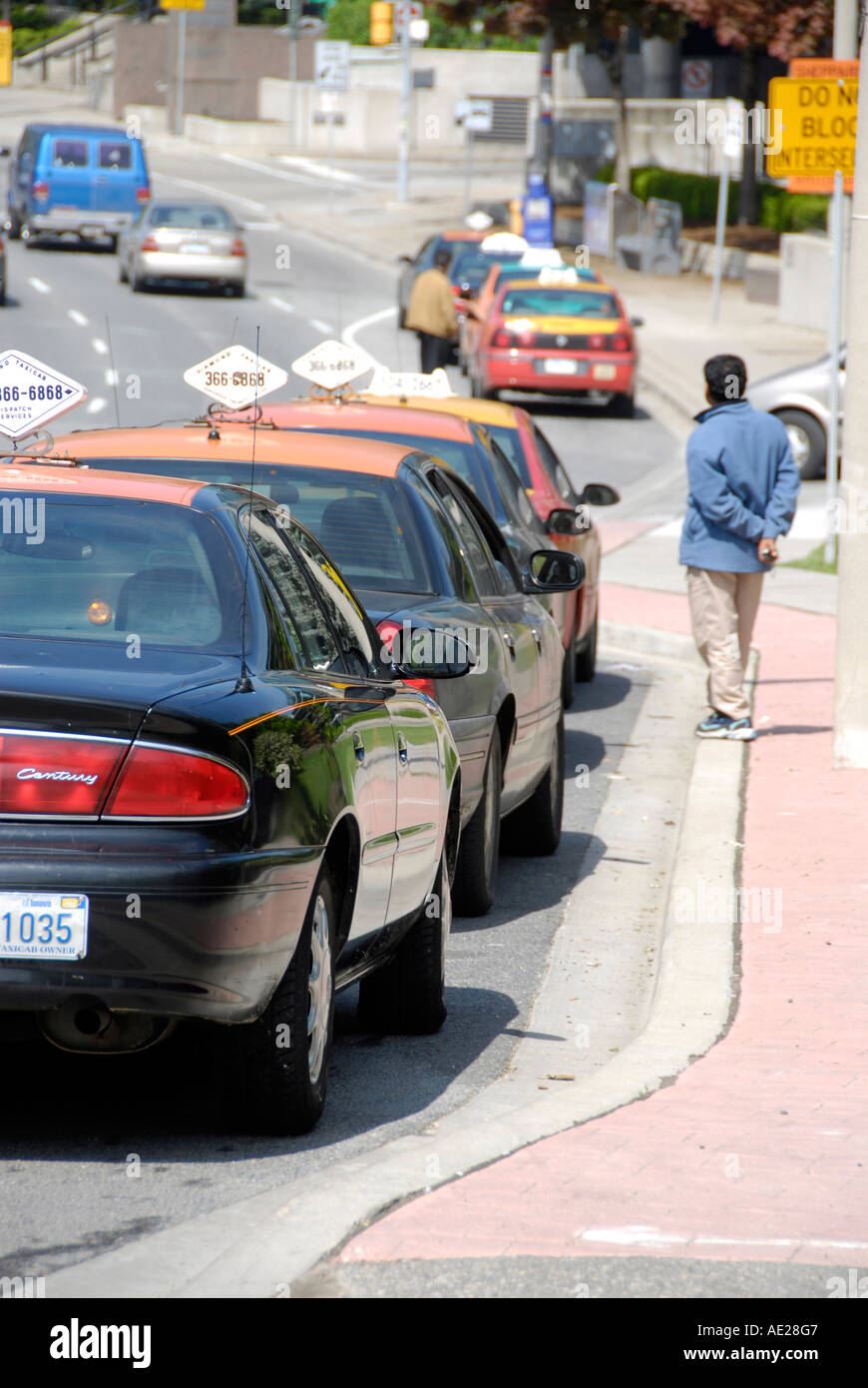 Taxi cabs line up outside a subway station in Toronto Ontario Canada ...