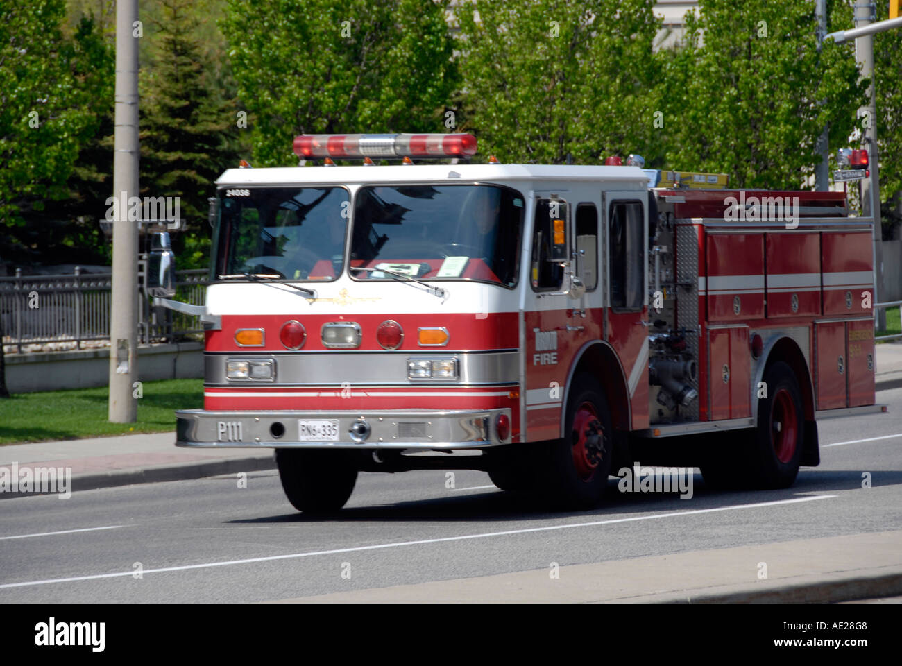 Fire truck races to an emergency Stock Photo - Alamy