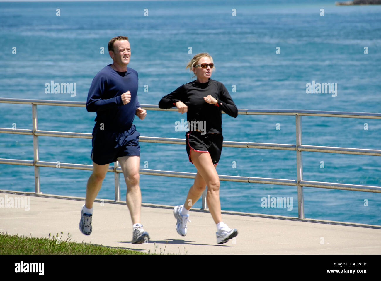 Husband and wife run for fitness and exercise Stock Photo - Alamy