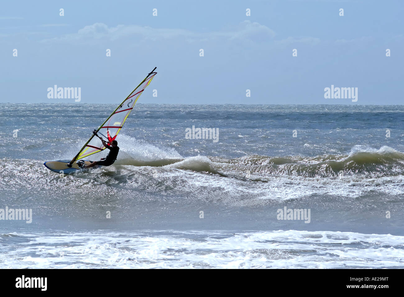 Riding the waves Stock Photo - Alamy