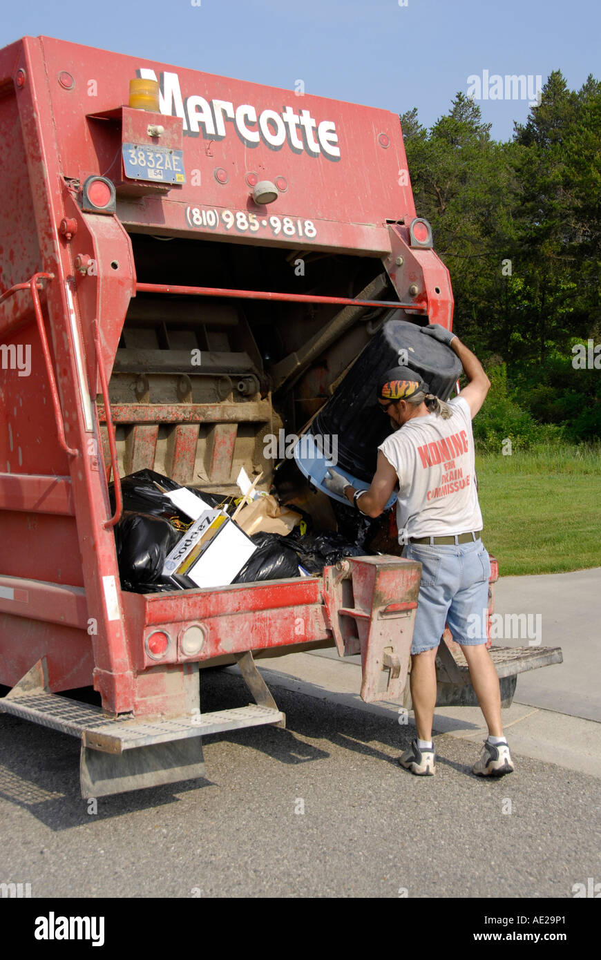 Residential trash collection crew pick up waste products Stock Photo ...