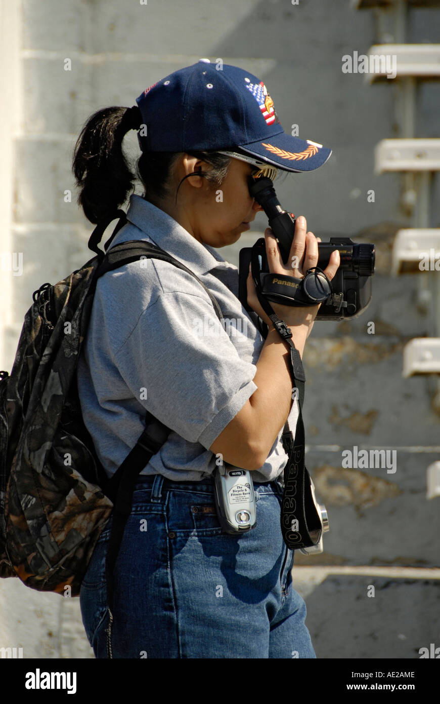 Female uses video camera record event hi-res stock photography and ...