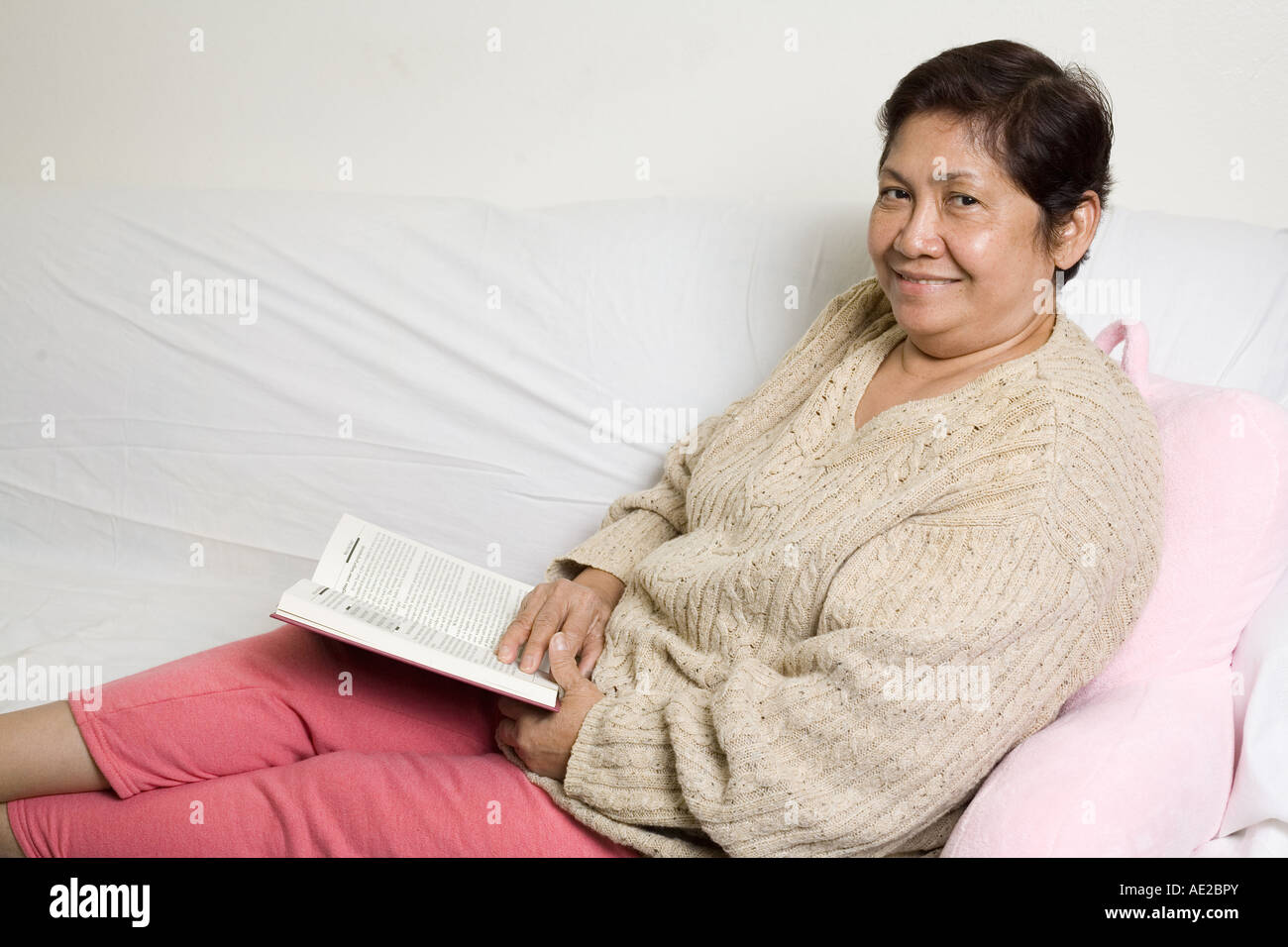 Reading at home Stock Photo - Alamy