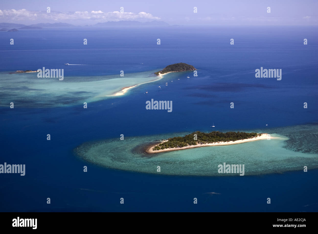 Black Island foreground Langford Island and Bird Island Whitsunday ...
