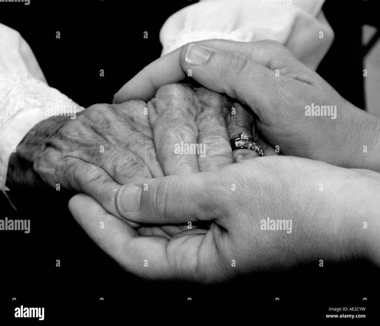 Interlock hands Black and White Stock Photos & Images - Alamy