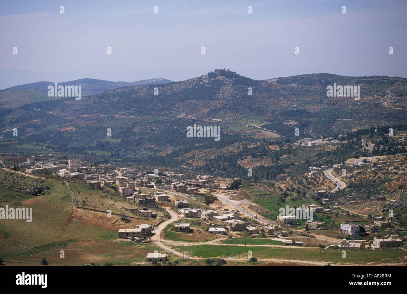 A view of the Jordan countryside and a small mountain village near the ...