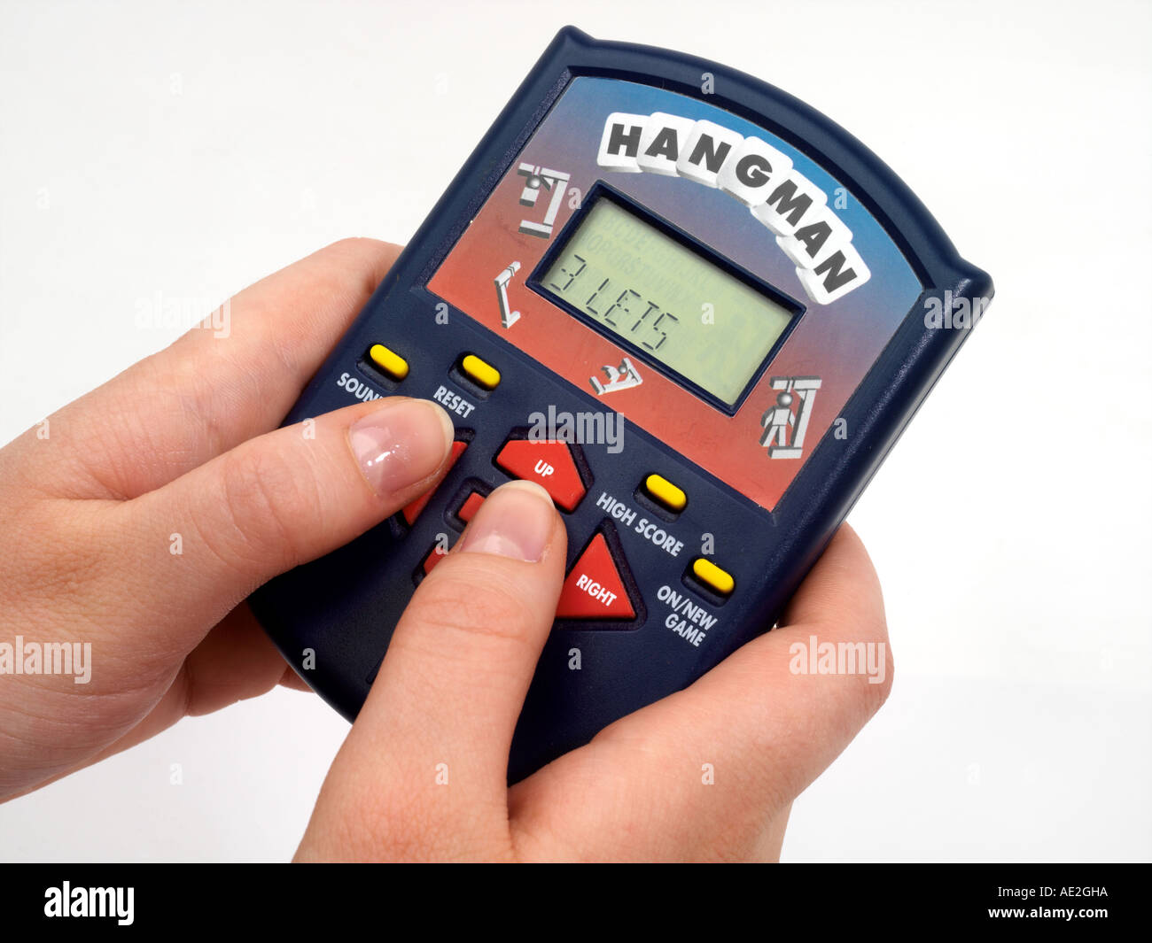 Hands Holding Small Handheld Game Hangman Stock Photo - Alamy