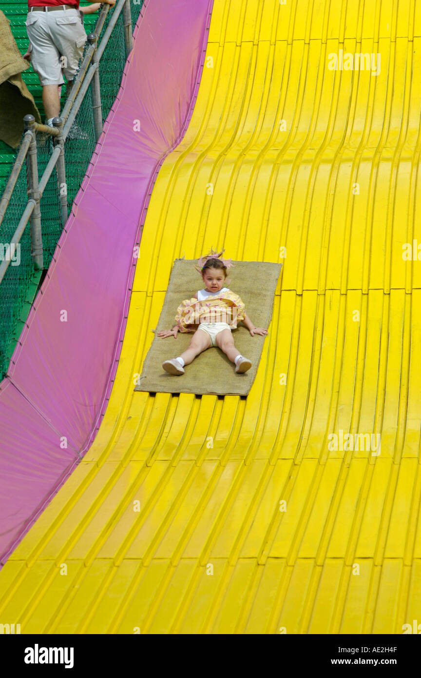 People on local carnival rides for fun during summer vacations at ...