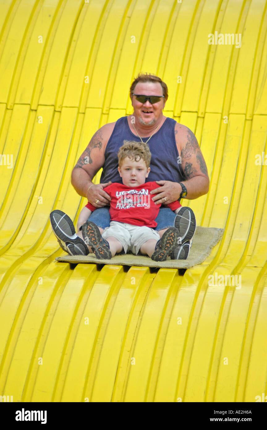 People on local carnival rides for fun during summer vacations at ...