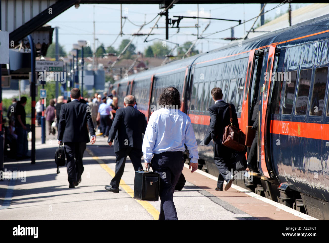 Businessmen getting off GNER Intercity 225 train at Grantham station ...