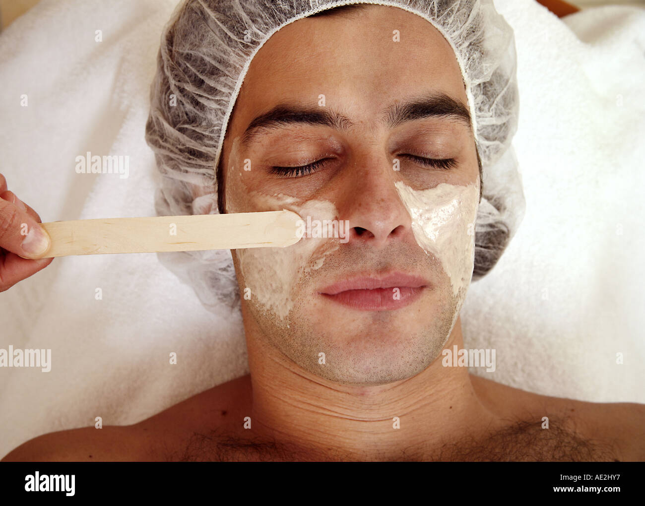 Man having a facial treatment in a spa Stock Photo - Alamy