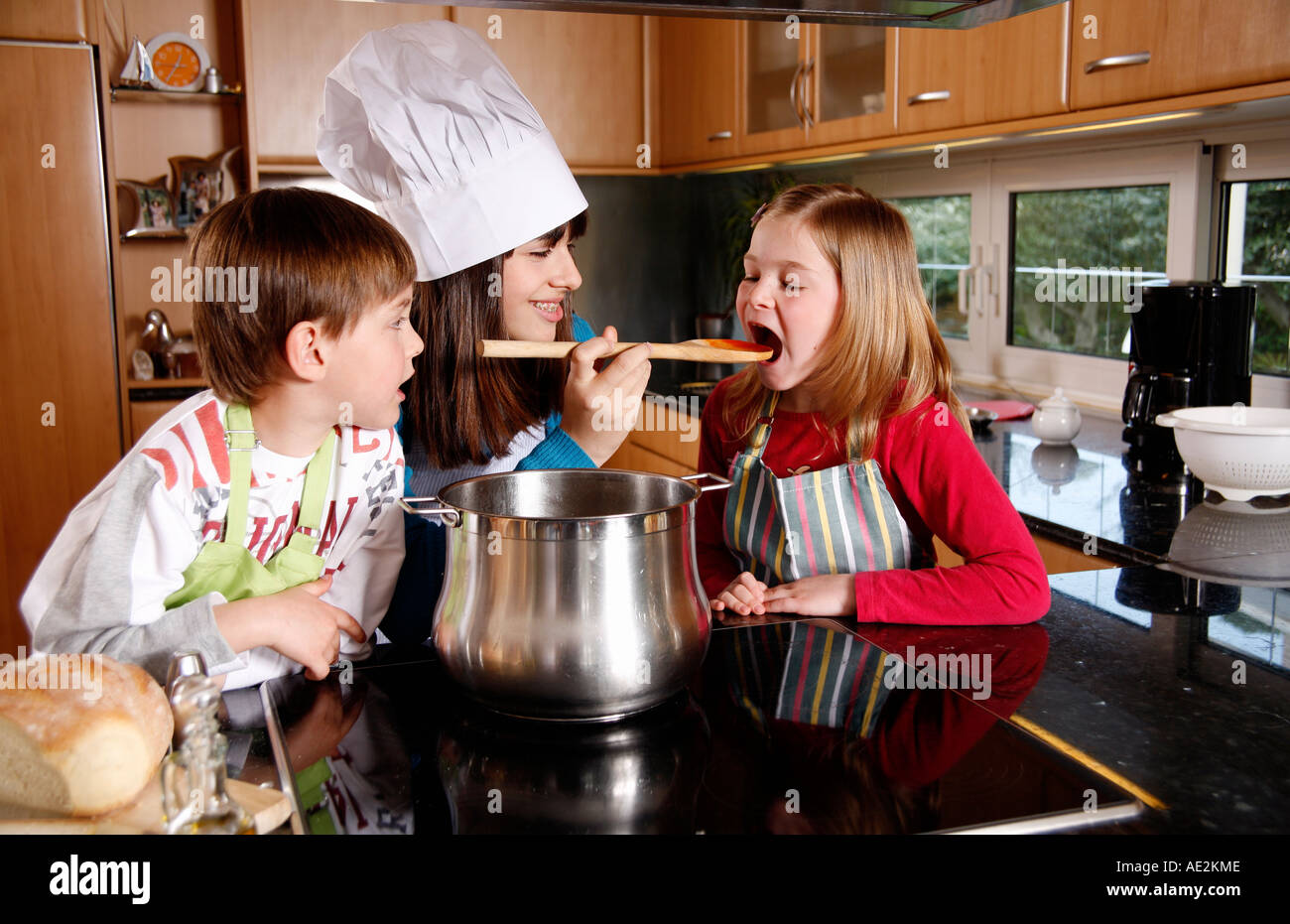 Children cooking spaghetti Stock Photo - Alamy