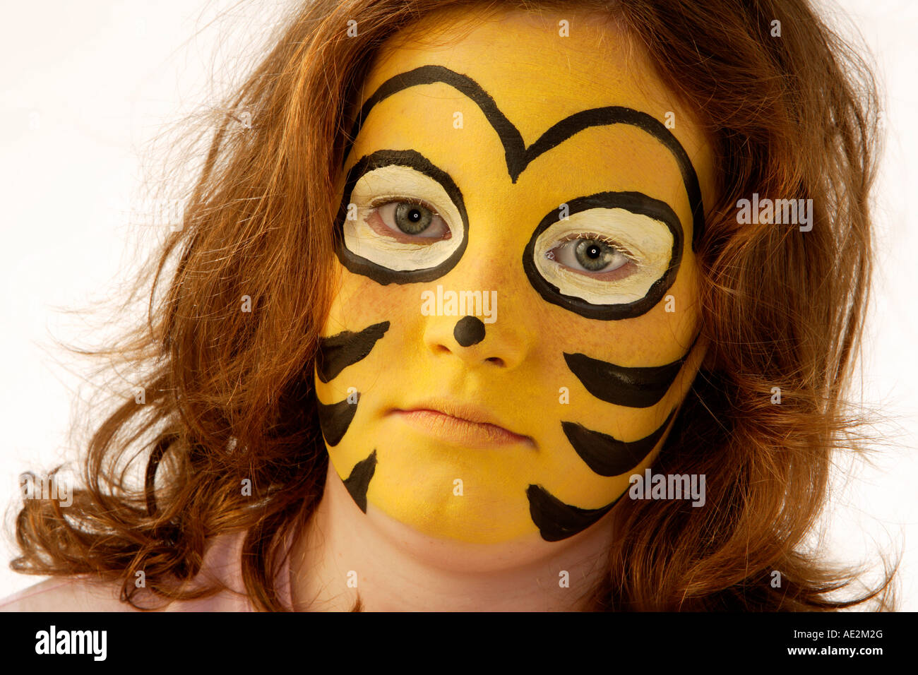 Portrait of girl (9-10 years) with bumble or wasp face paint Stock ...