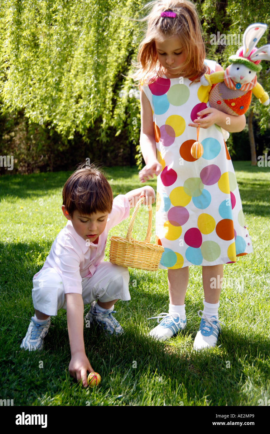 Boy and girl playing with dolls hi-res stock photography and images - Alamy