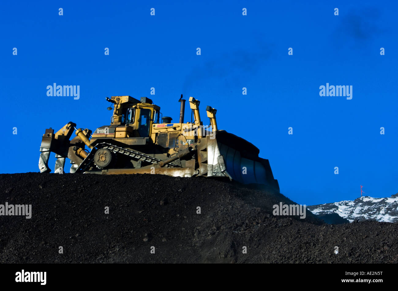 Slag dump slope stabilizing operation with bulldozer, Greater Sudbury ...