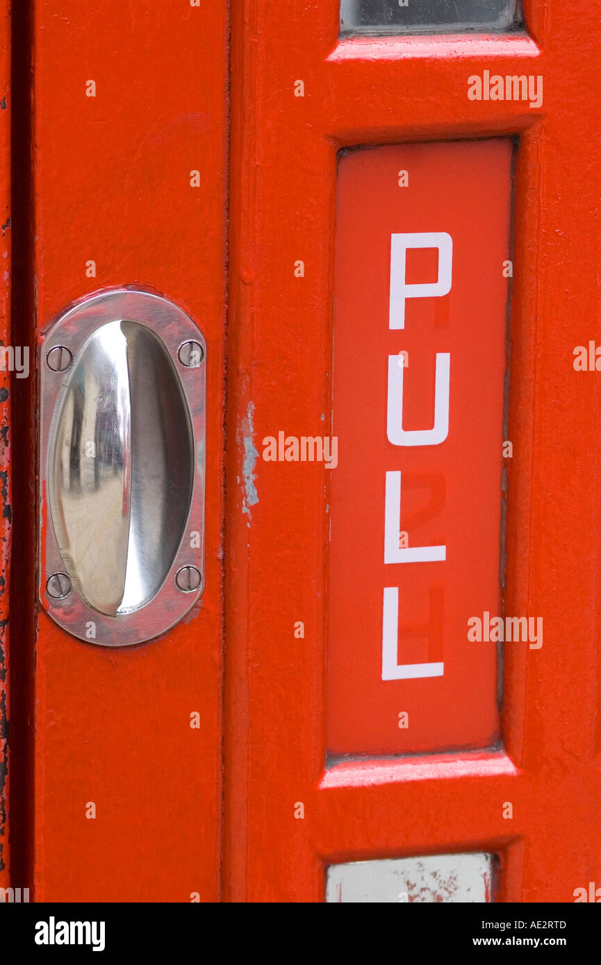 Door of telephone box kiosk in UK Stock Photo - Alamy