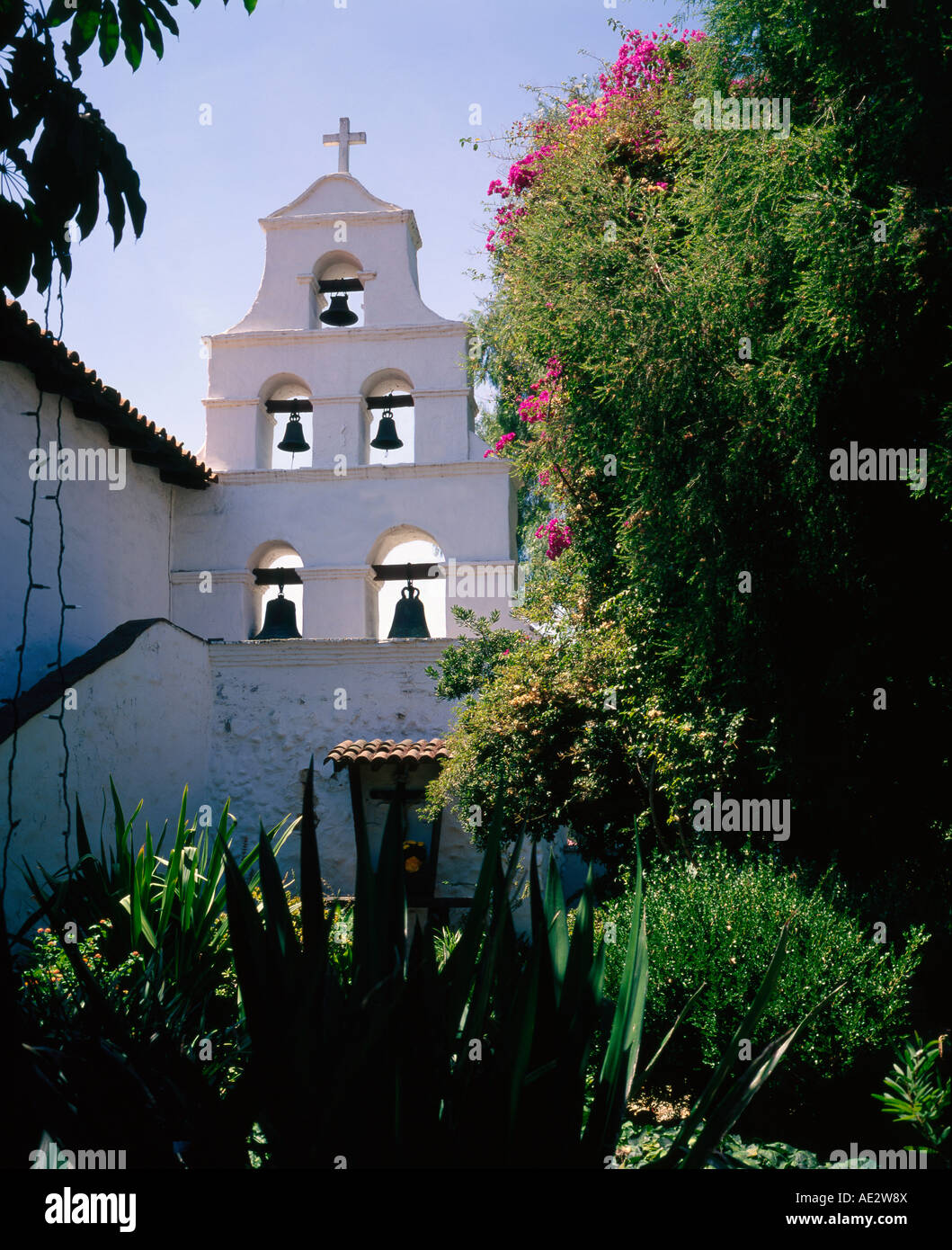 A church garden in California with a white wall structure incorporating ...