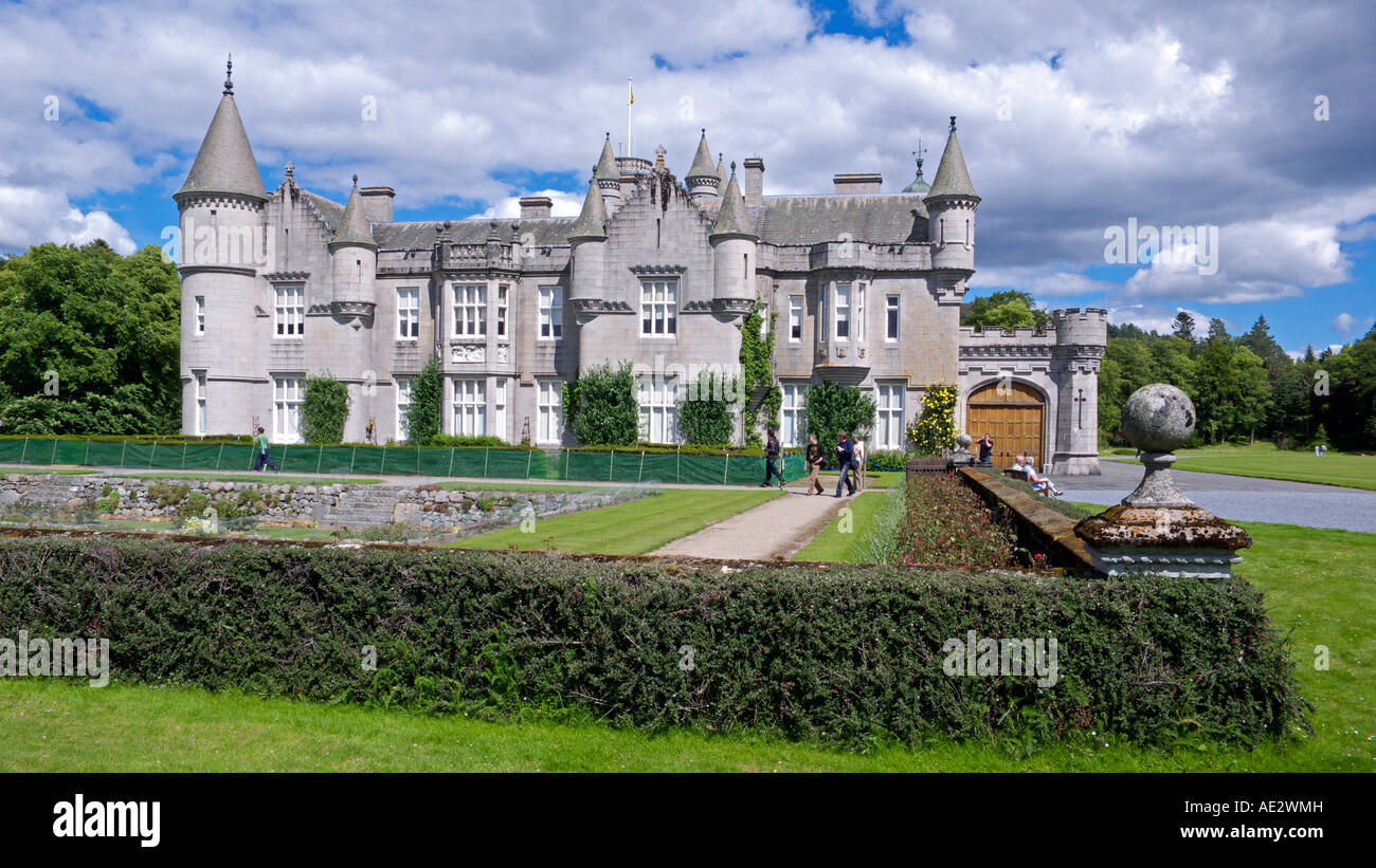 The west end gable view of Balmoral Castle with garden and hedge in ...