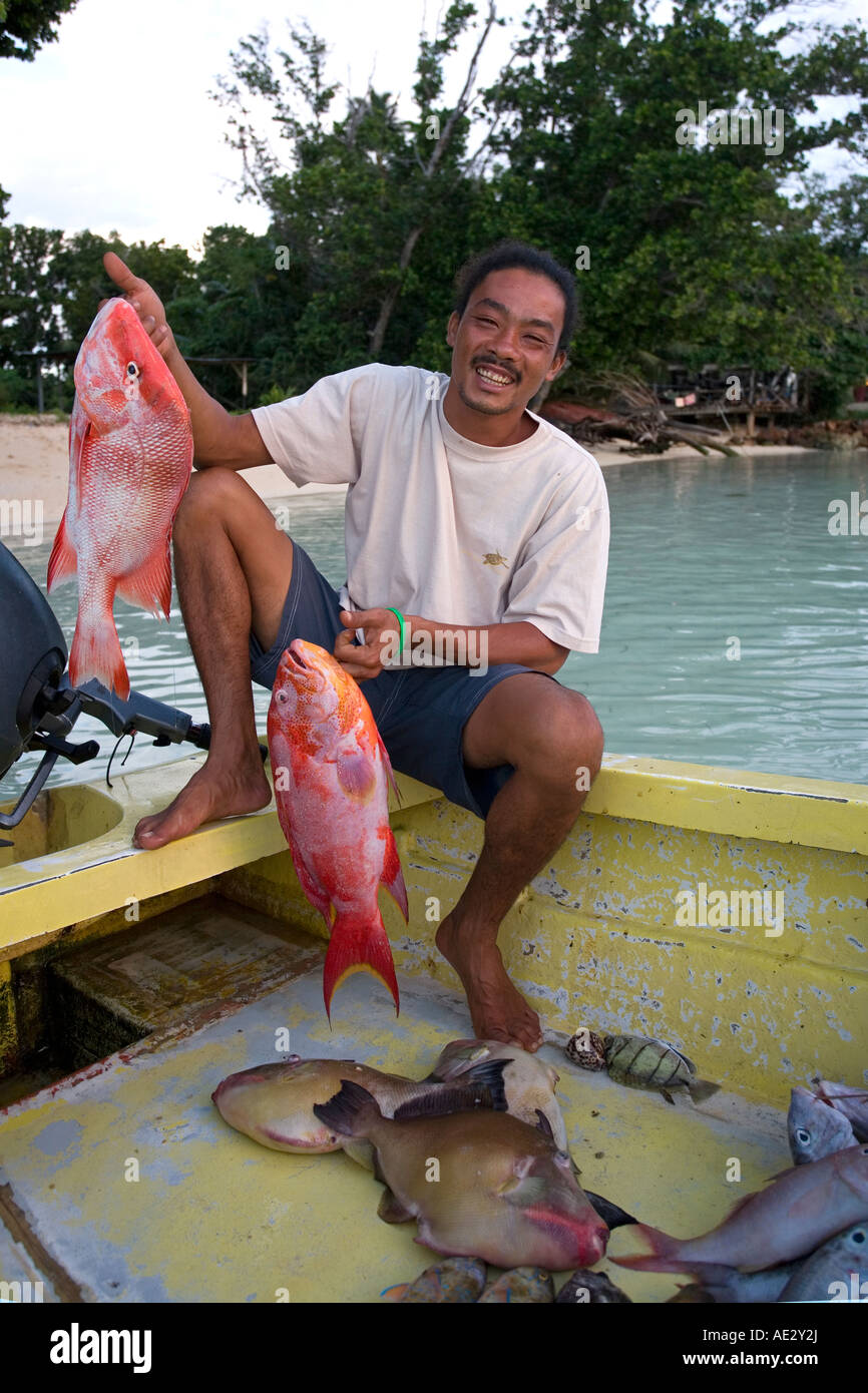 Fishermen on the island of La Digue Seychelles Stock Photo - Alamy