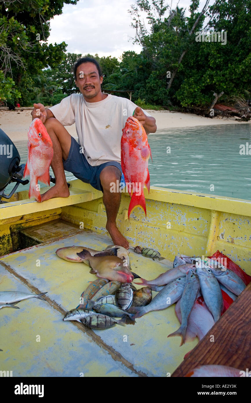 Fishermen on the island of La Digue Seychelles Stock Photo - Alamy