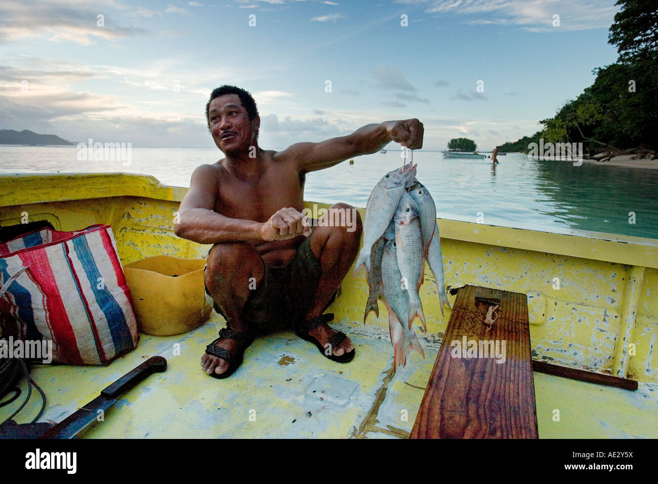 Fishermen on the island of La Digue Seychelles Stock Photo - Alamy