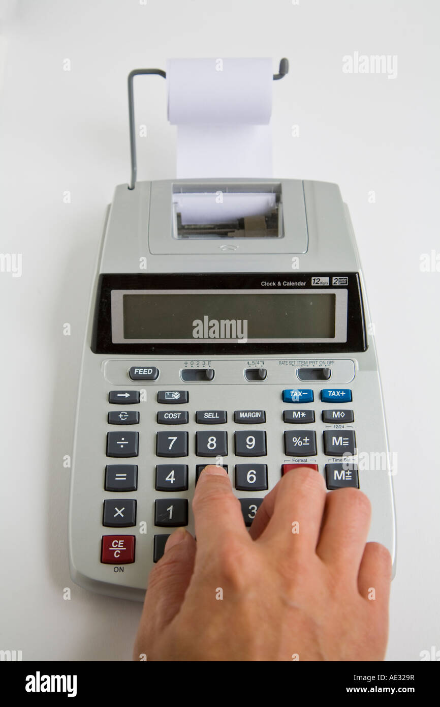 Handheld Calculator and Hand Stock Photo - Alamy