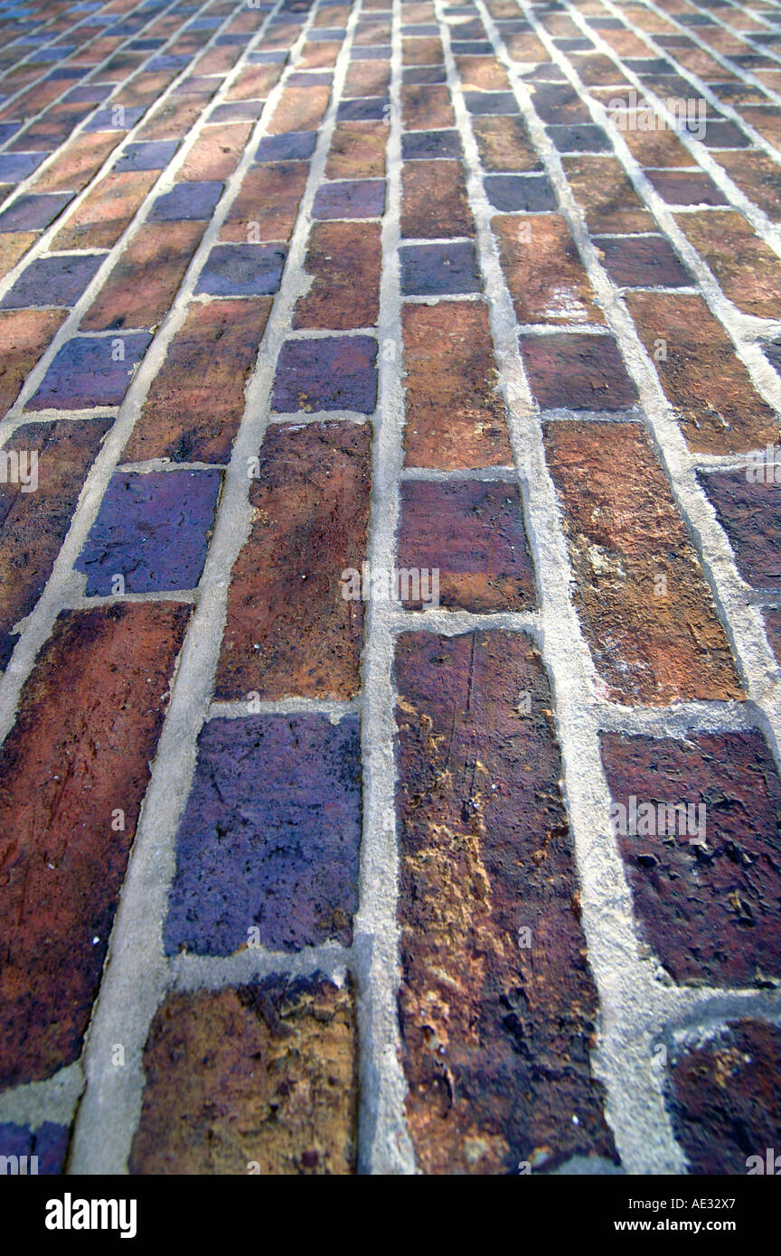 Brick pavement, converging lines in distance Stock Photo - Alamy