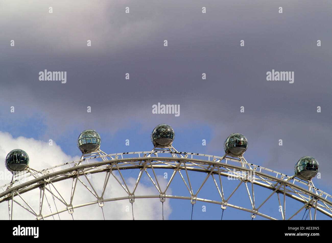 London eye capsules over cloudy blue sky backdrop Stock Photo - Alamy
