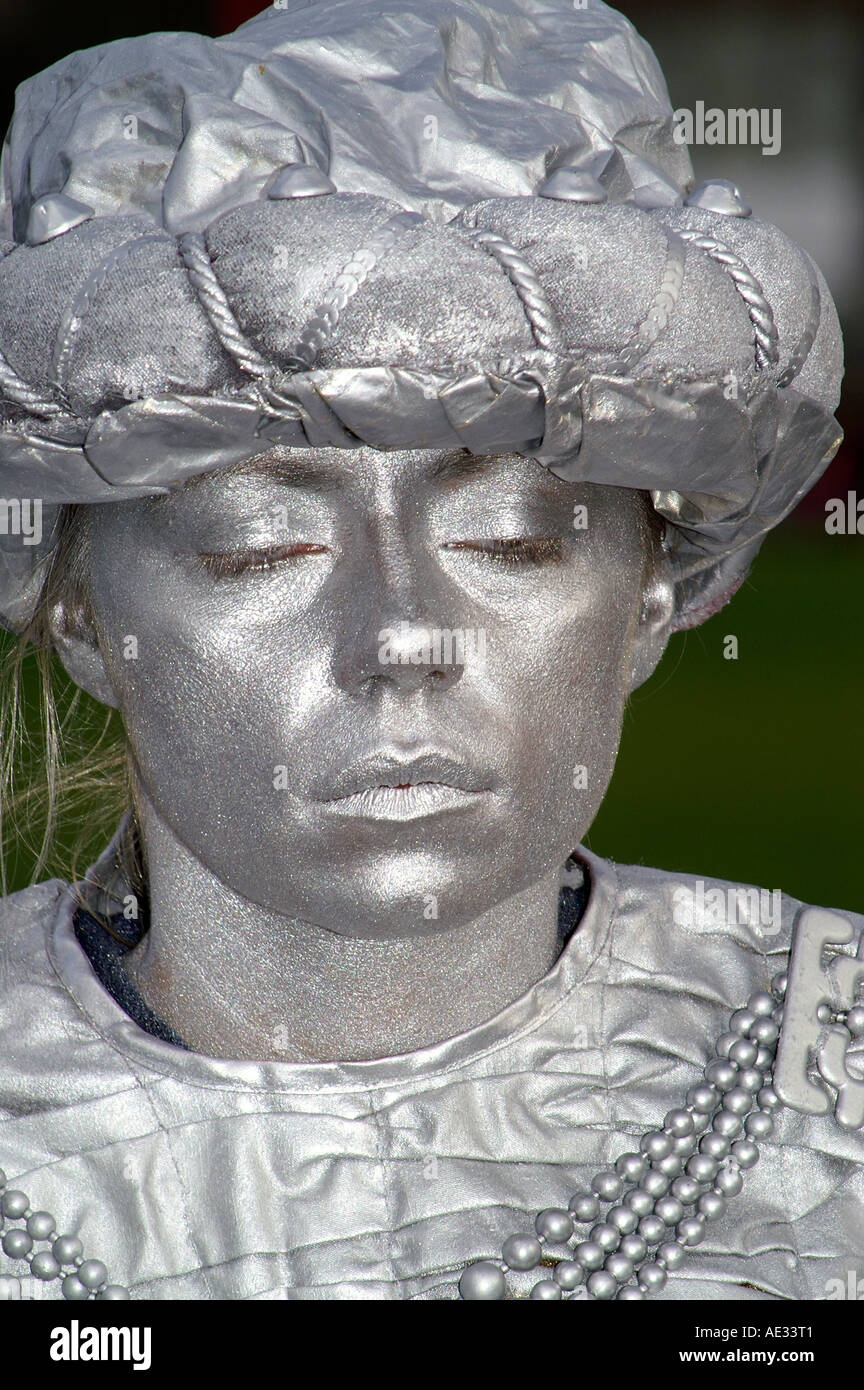 Live statue, silver woman face Stock Photo - Alamy