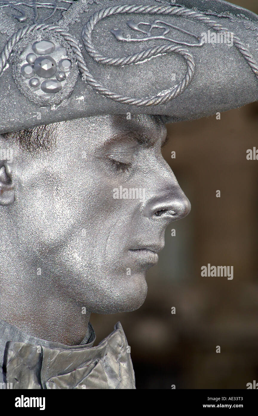 Live statue, silver man face Stock Photo - Alamy