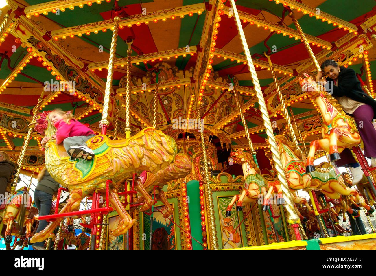 Colourful merry-go-round, animals Stock Photo - Alamy