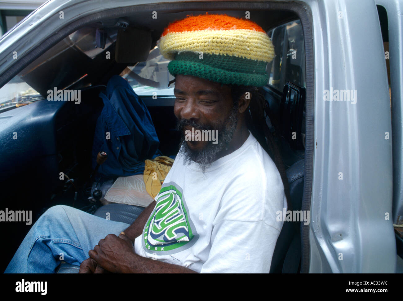 St Johns Antigua Happy Rastafarian In Car Stock Photo - Alamy
