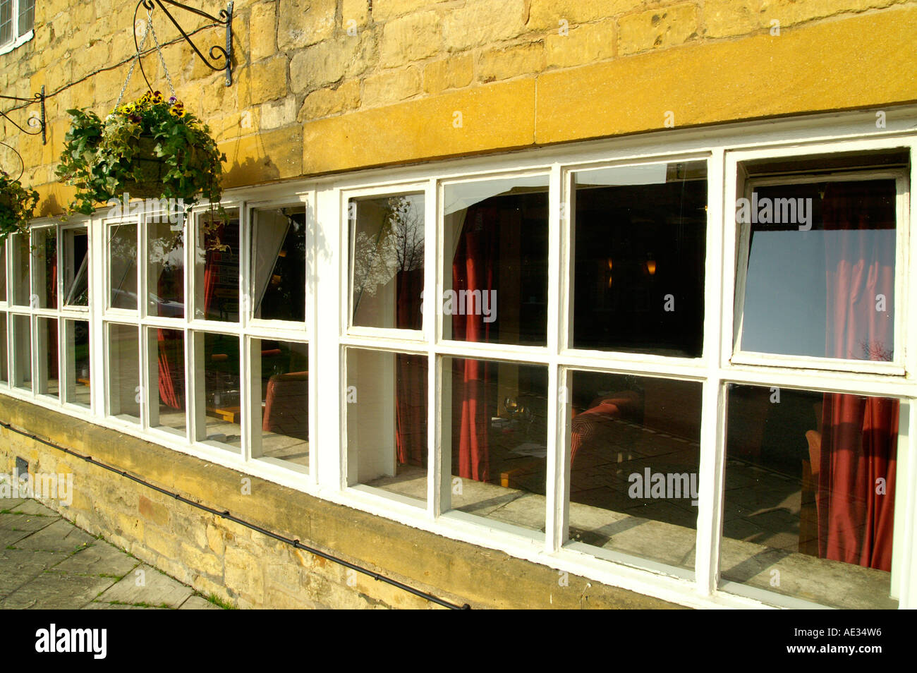 Long window on Broadway mansion Stock Photo - Alamy