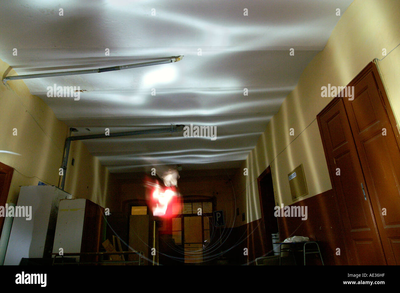 Eerie scary hall with dancing light lines Stock Photo - Alamy