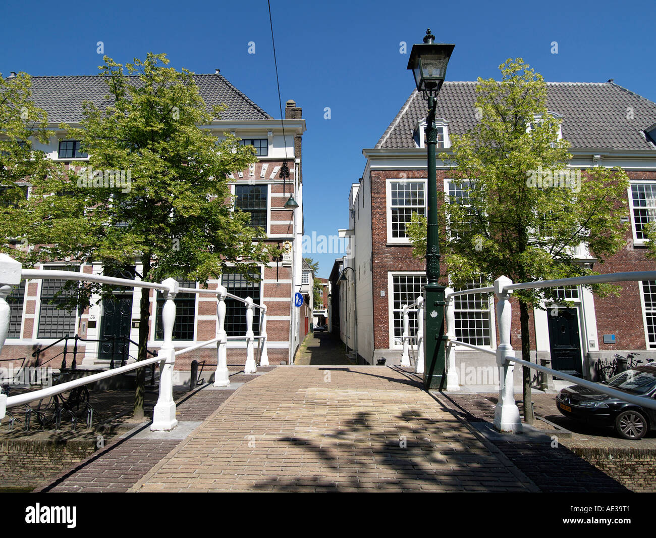 Bridge across the Oude Delft canal in the historic city centre of Delft ...