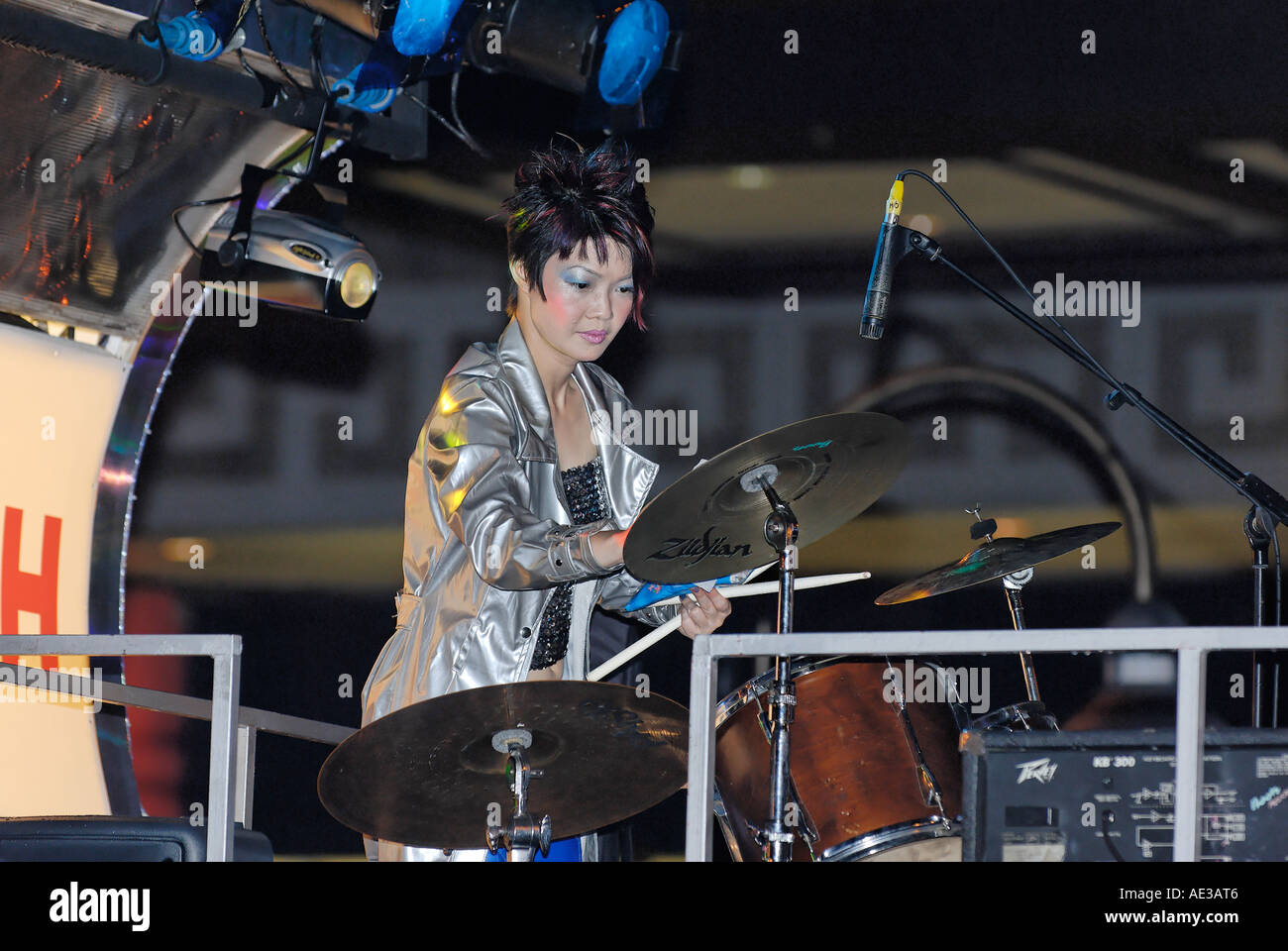 Asian girl drummer hi-res stock photography and images - Alamy