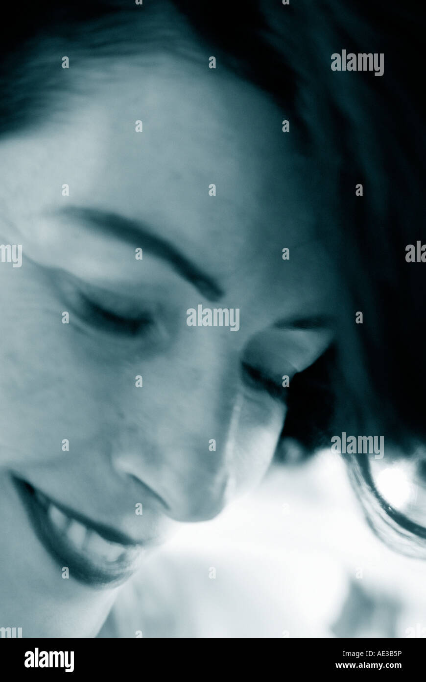 woman smiles with closed eyes Stock Photo - Alamy