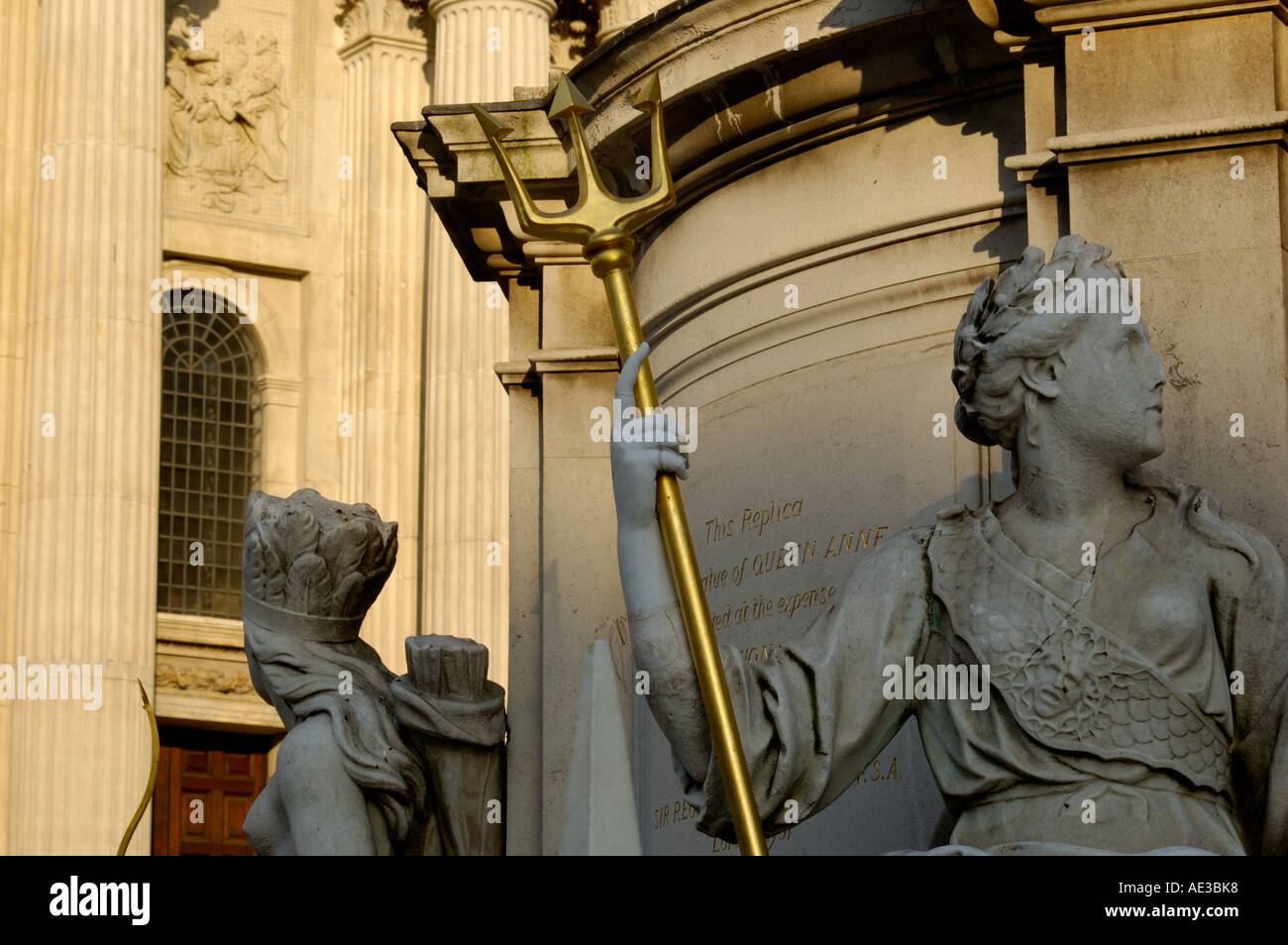 Statue of woman holding trident Stock Photo - Alamy