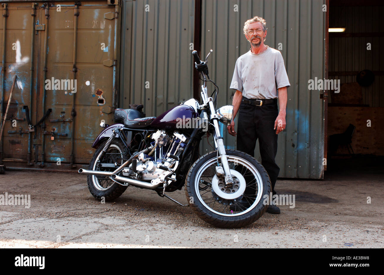 Harley Davison motorbike & Graham in front of garage Stock Photo - Alamy