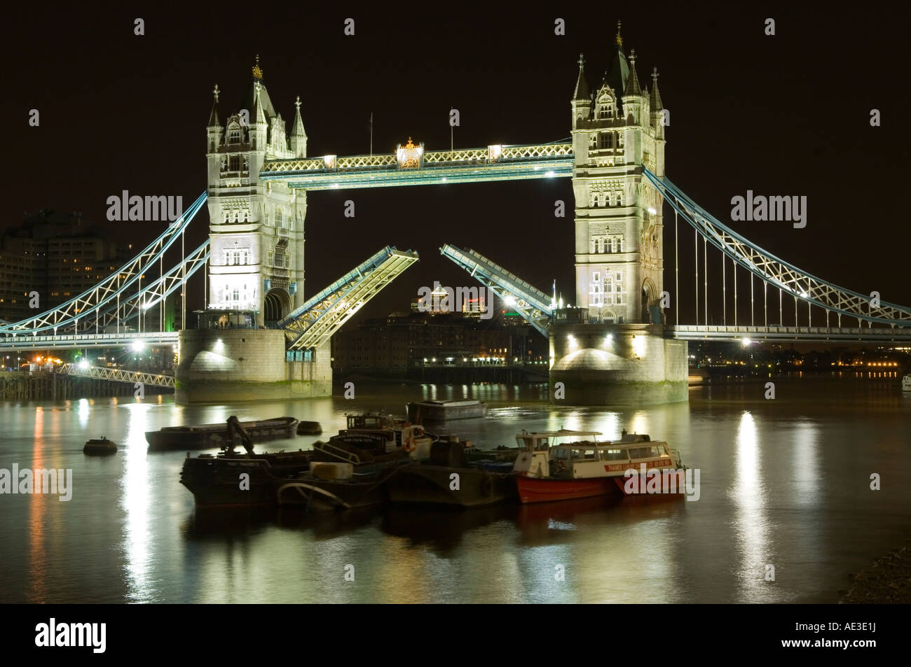 Tower Bridge opening at night in London England UK Stock Photo - Alamy